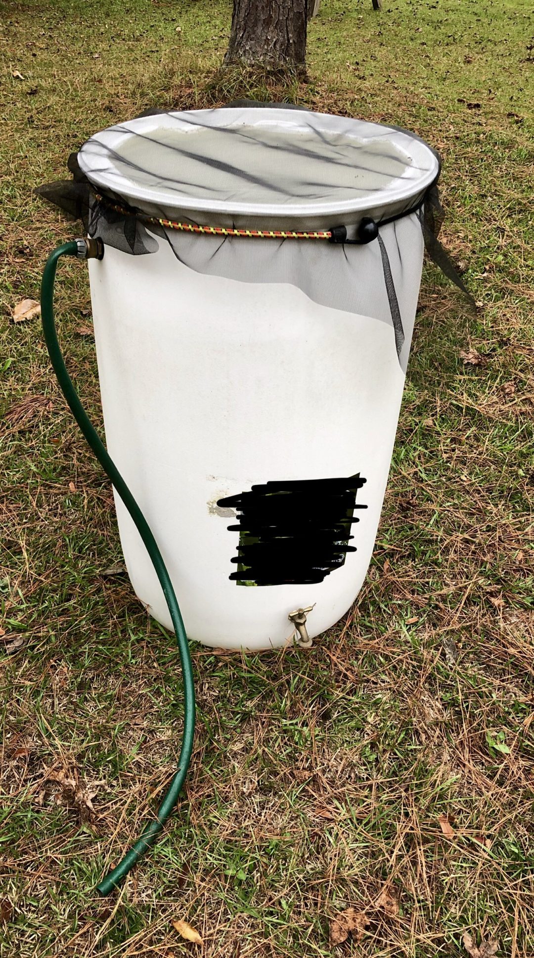 Plans and photos of a simple rainwater catch system. | American Partisan